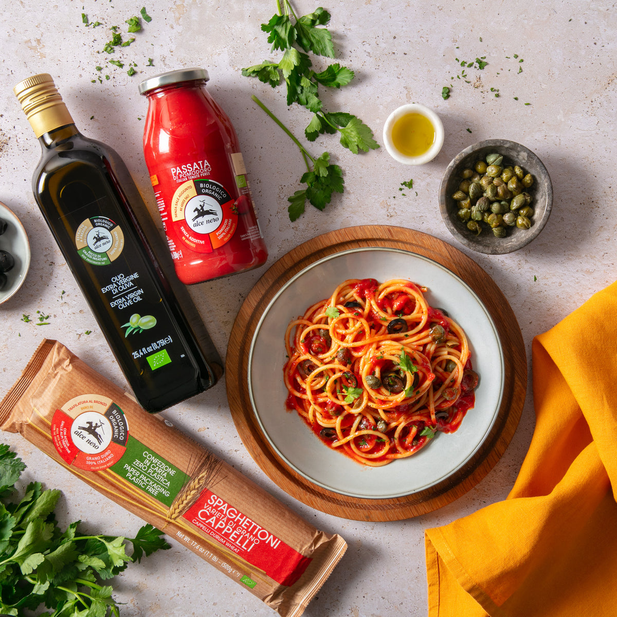 Spaghettoni grano duro Cappelli alla Puttanesca | Ricette Alce Nero